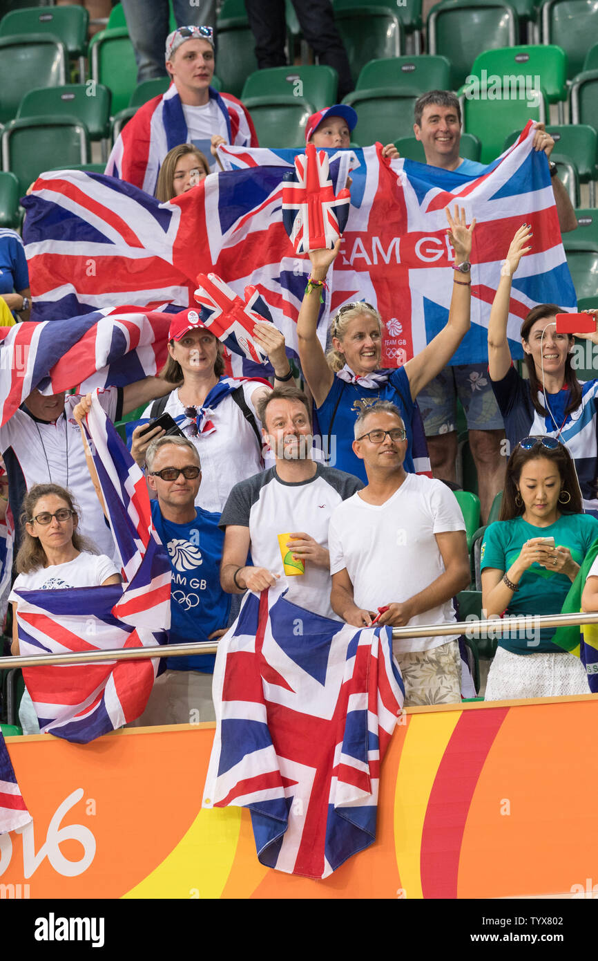 British fans cheer for the cyclists of team Great Britain during the ...