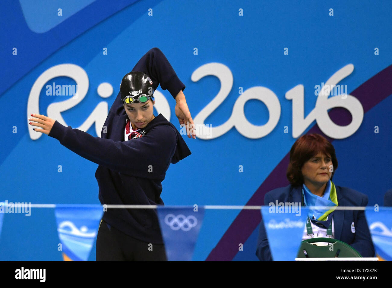 Women's 200M Backstroke winner Madeline Dirado (USA) stretches before ...