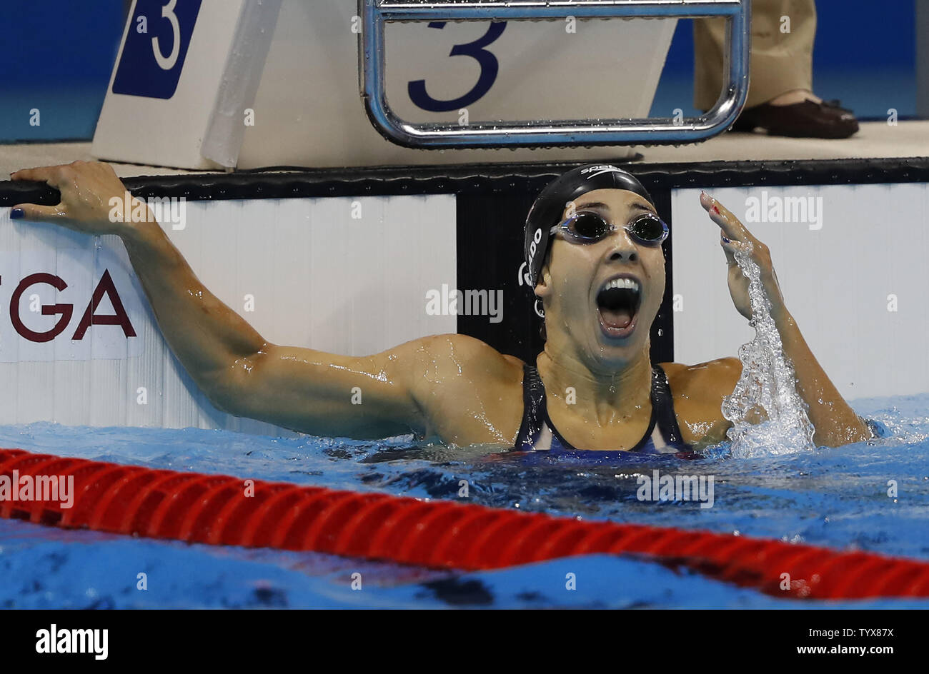 Madeline Dirado (USA) wins the gold in the Women's 200M Backstroke with ...