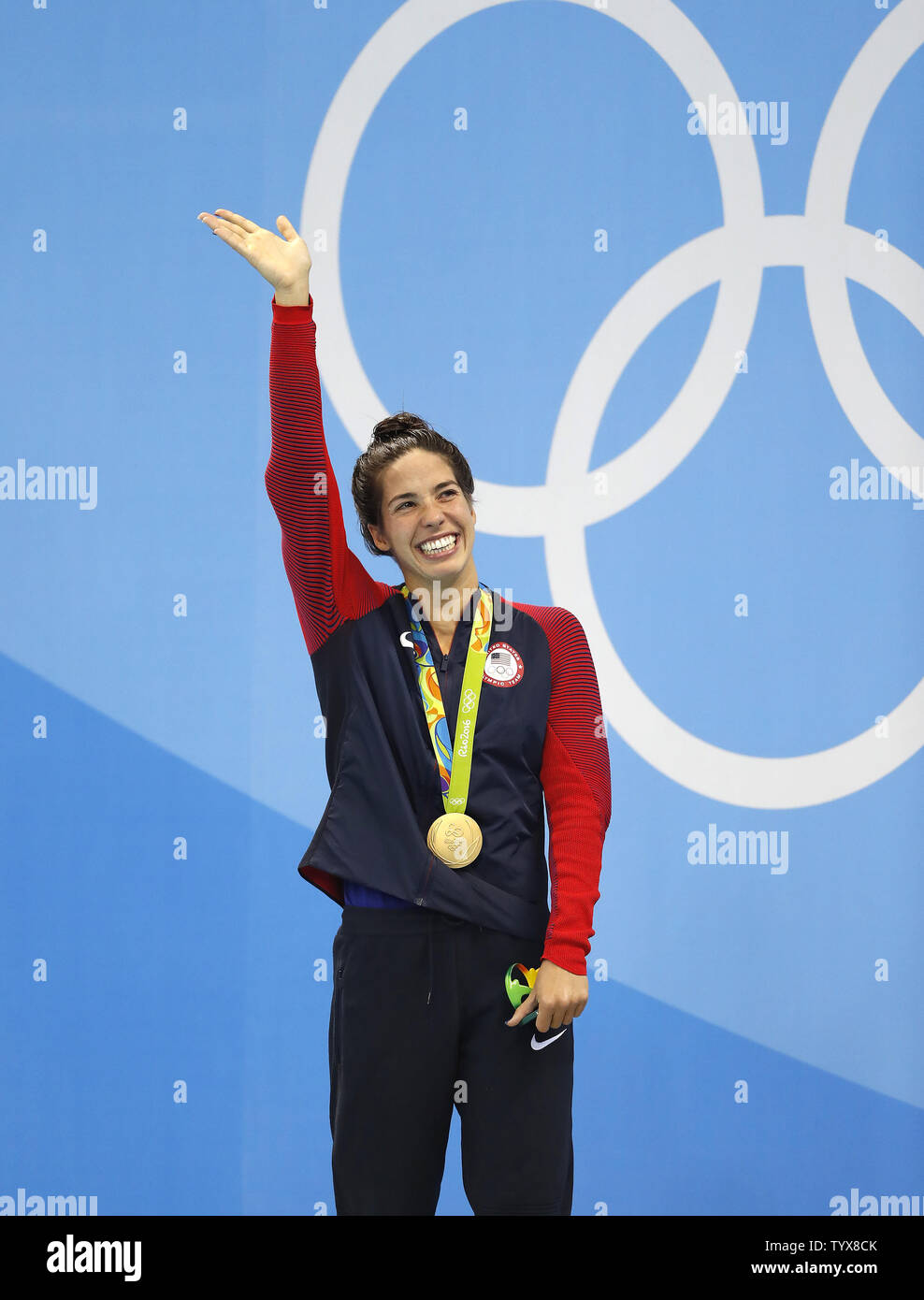 Madeline Dirado (USA) reacts after receiving her gold medal in the ...