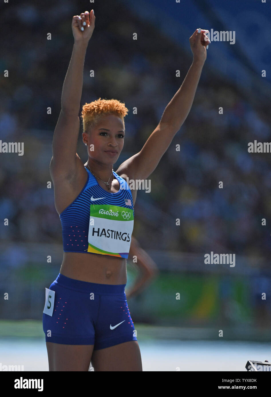 USA's Natasha Hastings waves before running in her heat for the Women's ...