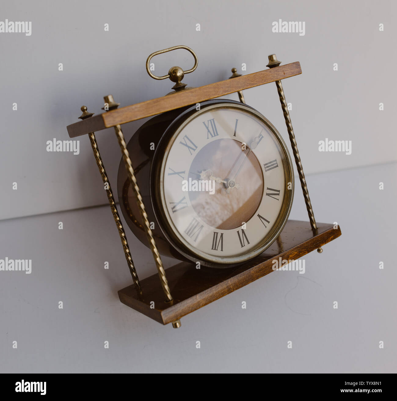 Old soviet table clock with mechanical winding Stock Photo - Alamy