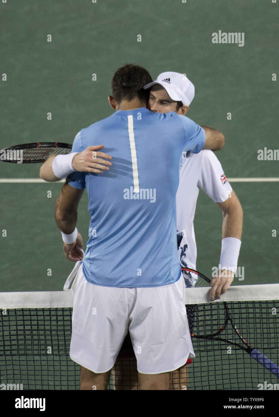Andy Murray of Great Britain is embraced by Juan Mart’n del Potro of ...