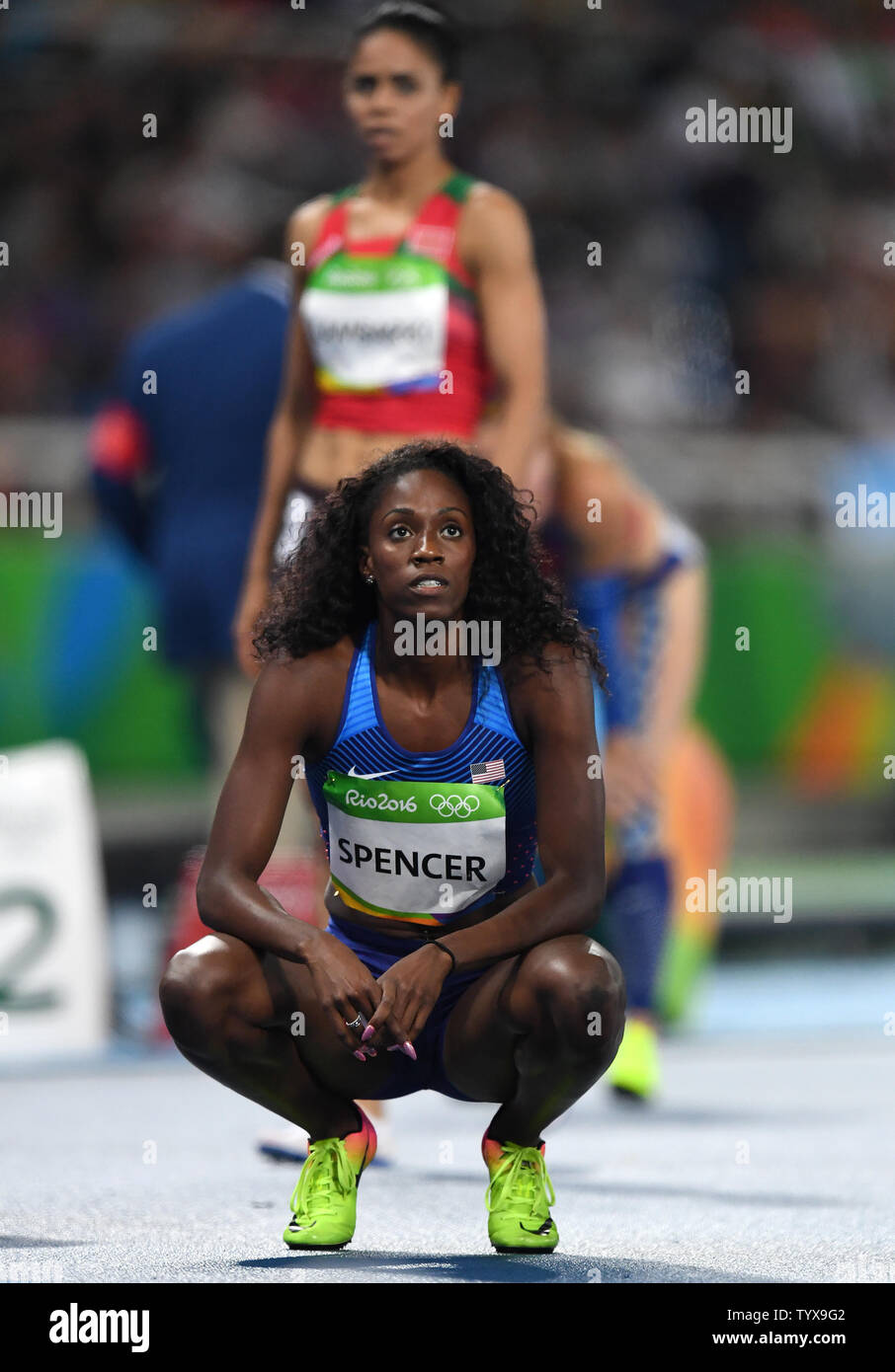 Ashley Spencer (USA) reacts after qualifying for the final during a ...