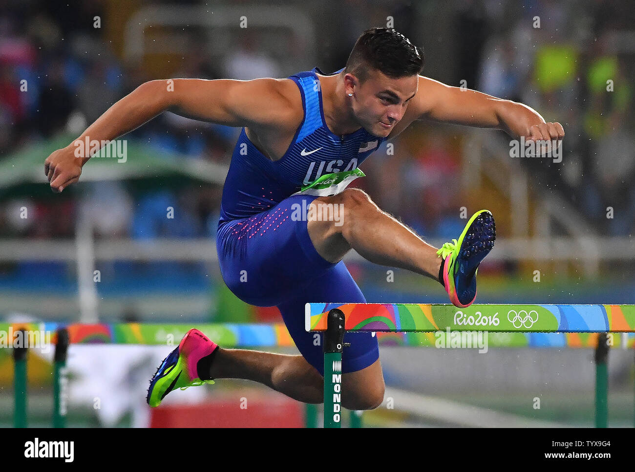 Devon Allen (USA) qualifies for the final in a Men's 110m Hurdles heat ...