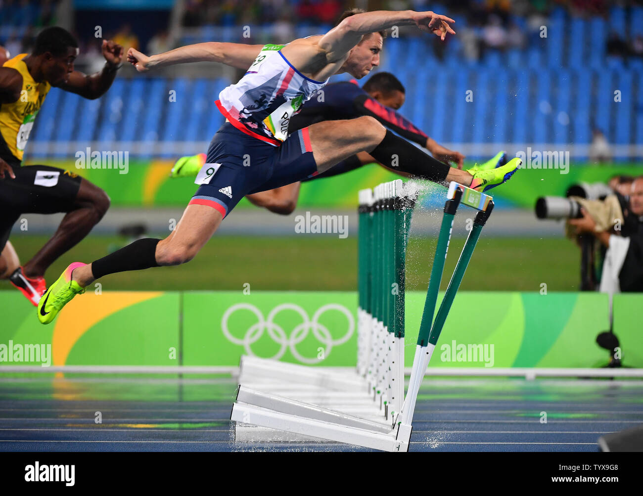 Andrew Pozzi (GBR) contacts a hurdle during a Men's 110m Hurdles heat ...