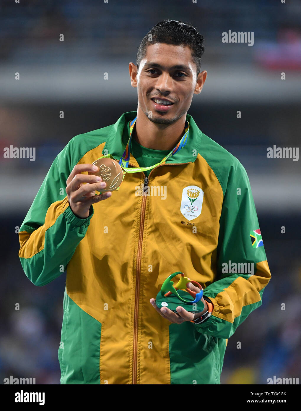 Wayde Van Niekerk (RSA) celebrates his world record gold medal time ...