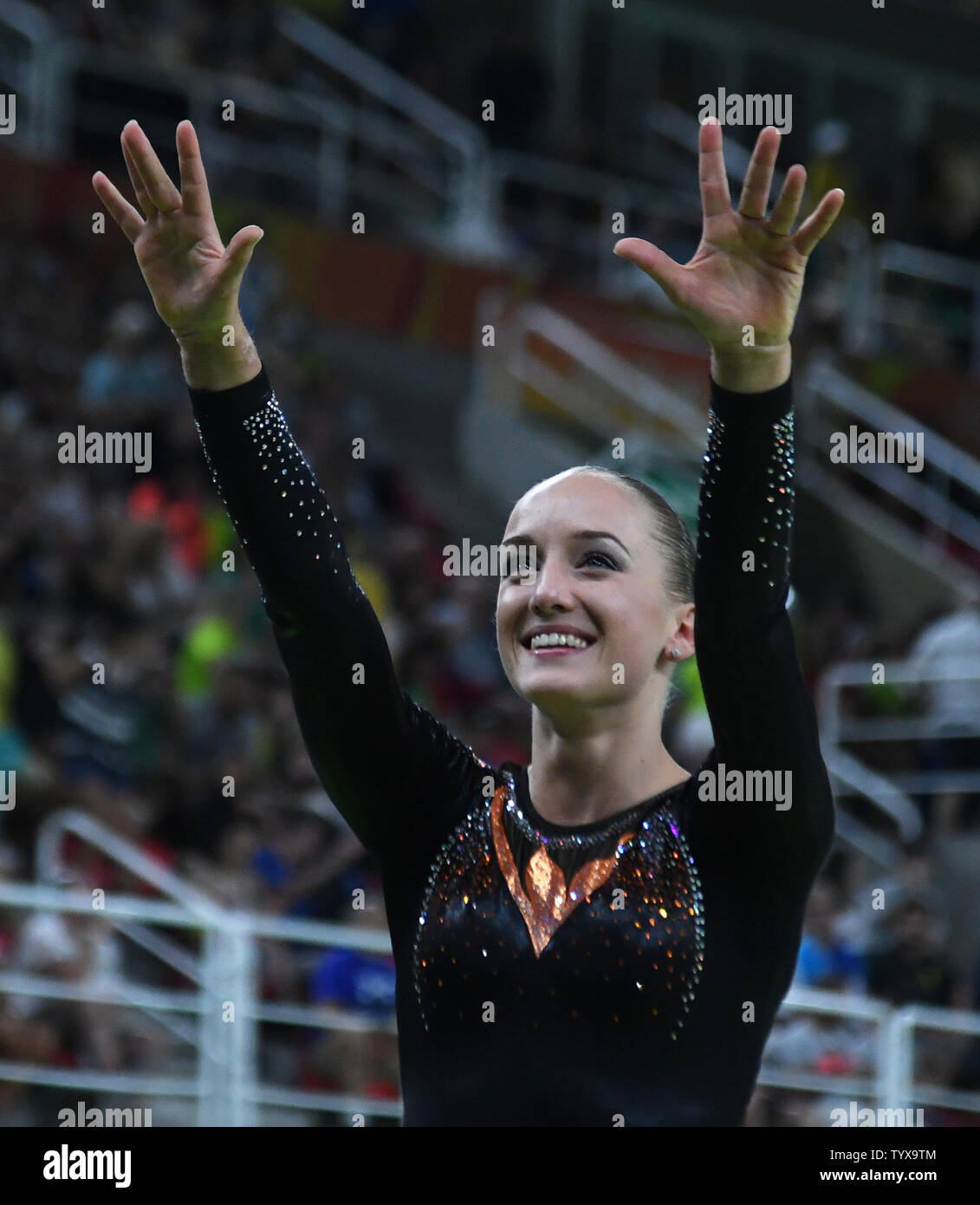 Sanne Wevers of Netherlands waves to the audience after winning gold on ...