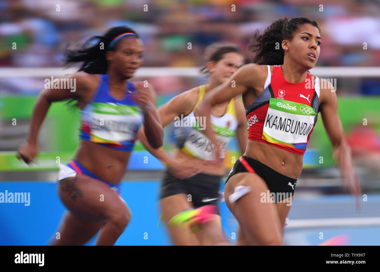 Mujinga Kambundji of Switzerland runs in the Women's 200m Round 1 at ...