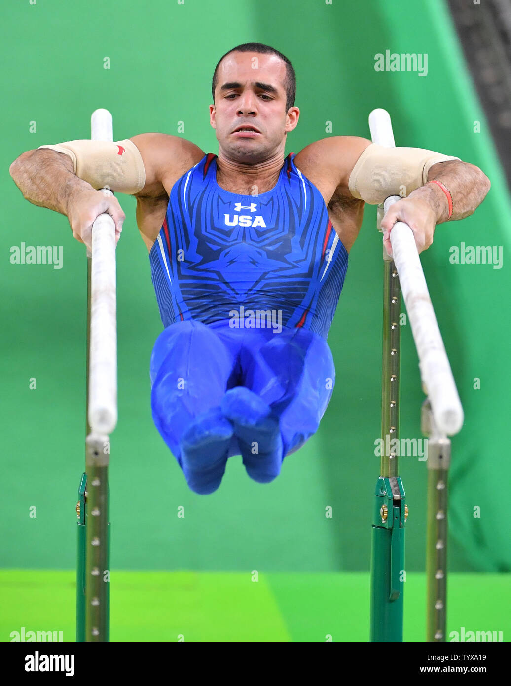 Danell Leyva of the United States competes in the men's parallel bars ...