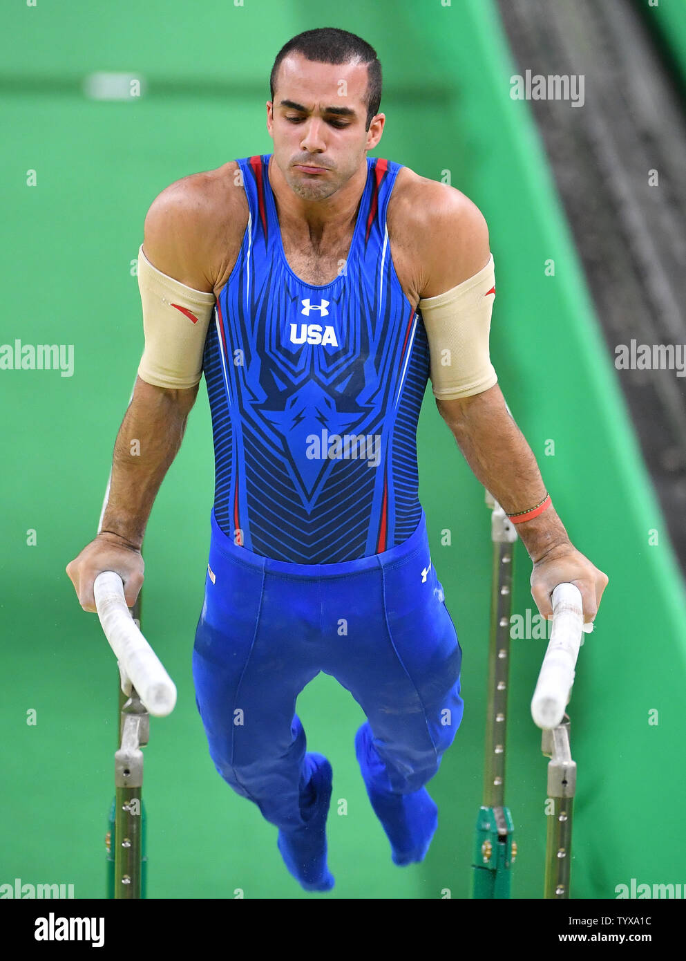 Danell Leyva of the United States competes in the men's parallel bars ...