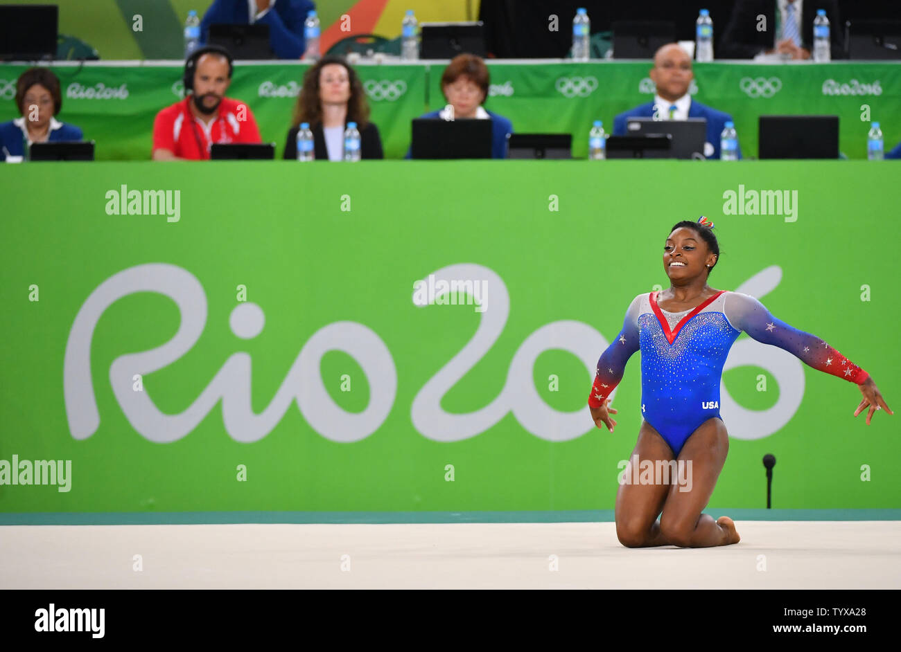 Simone Biles of the United States competes and wins the gold medal in ...