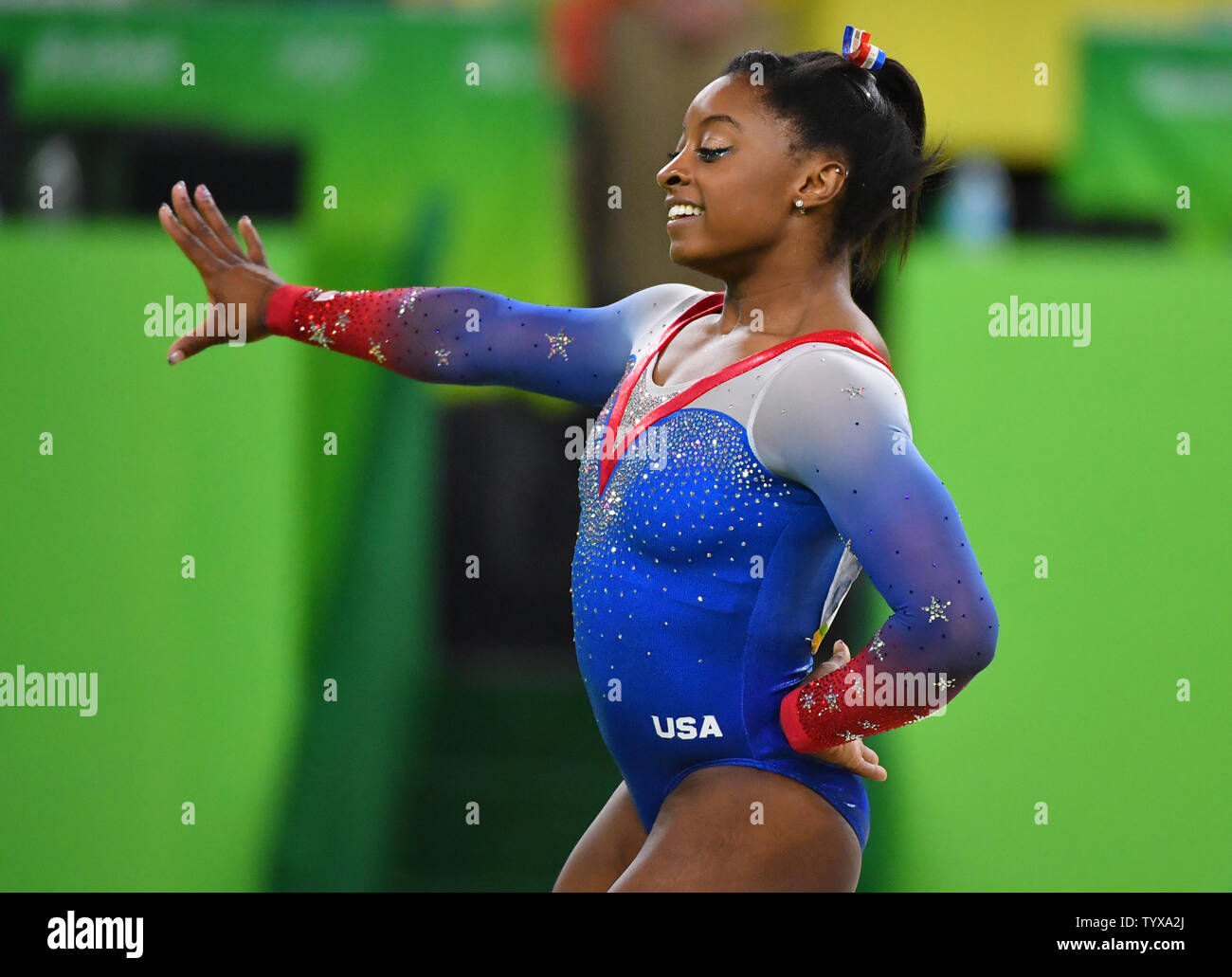 Simone Biles of the United States competes and wins the gold medal in ...