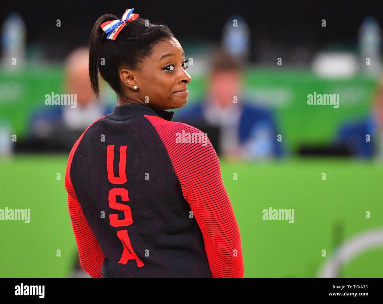 Simone Biles of the United States stands on the floor after winning the ...