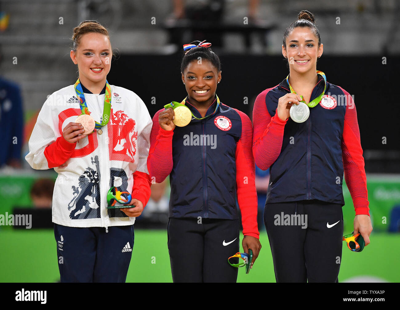 Silver medalist Alexandra Raisman of the United States, gold medalist ...