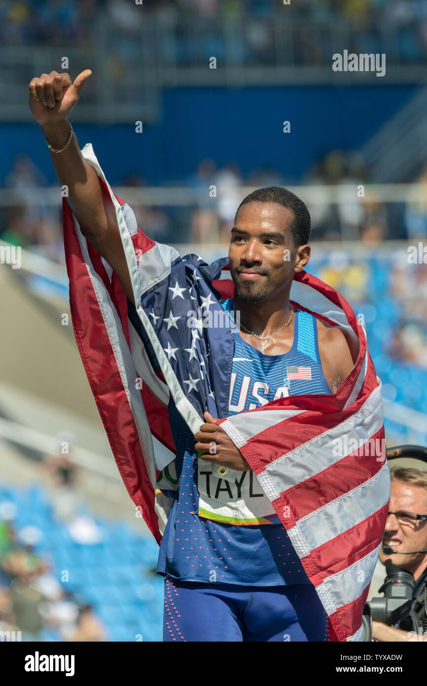 Christian Taylor (USA) celebrates his gold medal win during the Men's ...