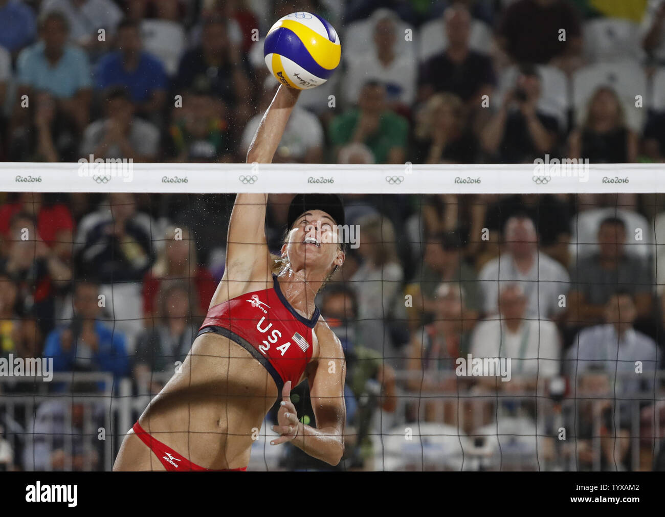 April Ross of the United States returns a ball in the Beach Volleyball ...