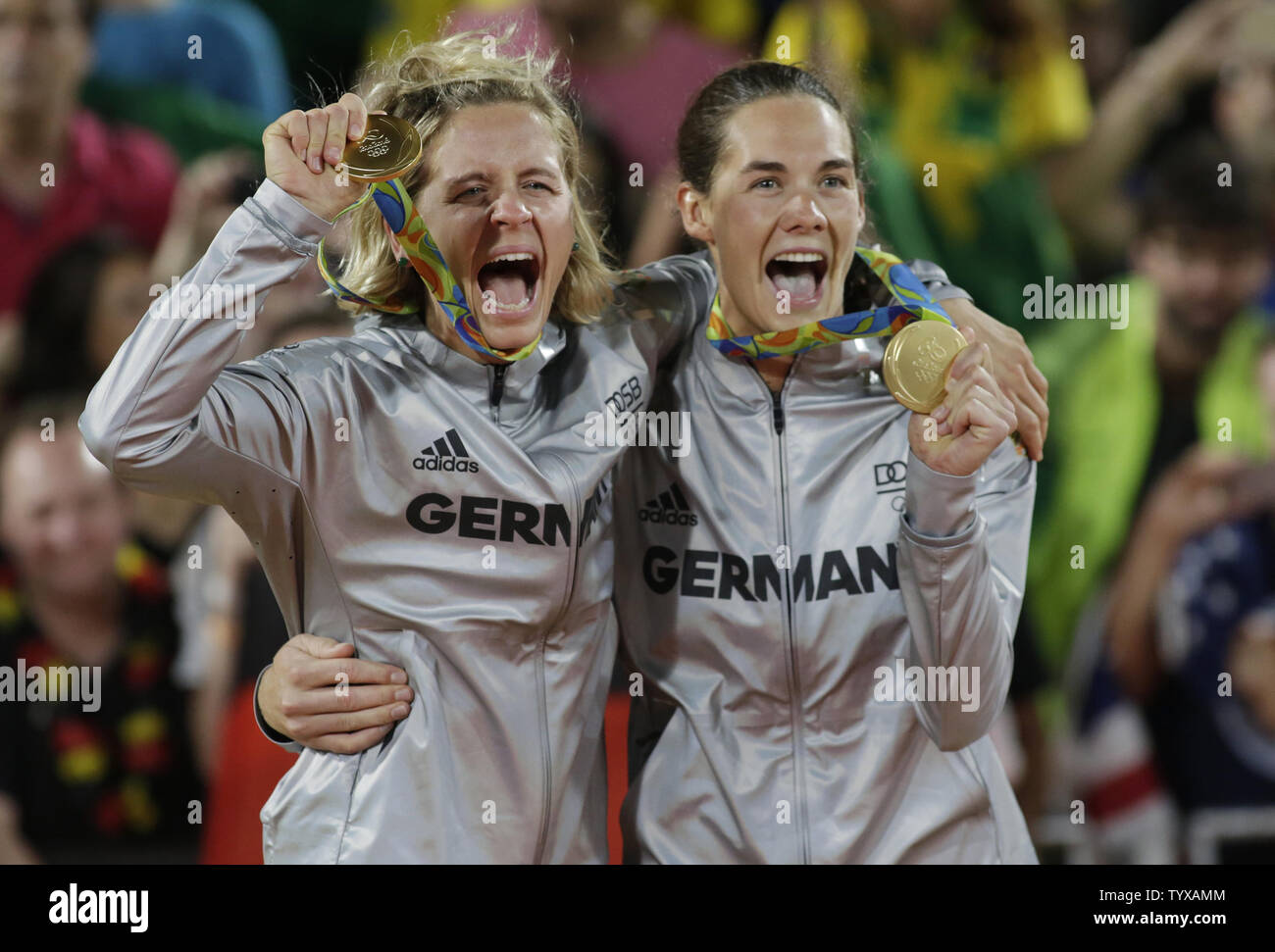 Laura Ludwig and Kira Walkenhorst of Germany celebrate after winning ...