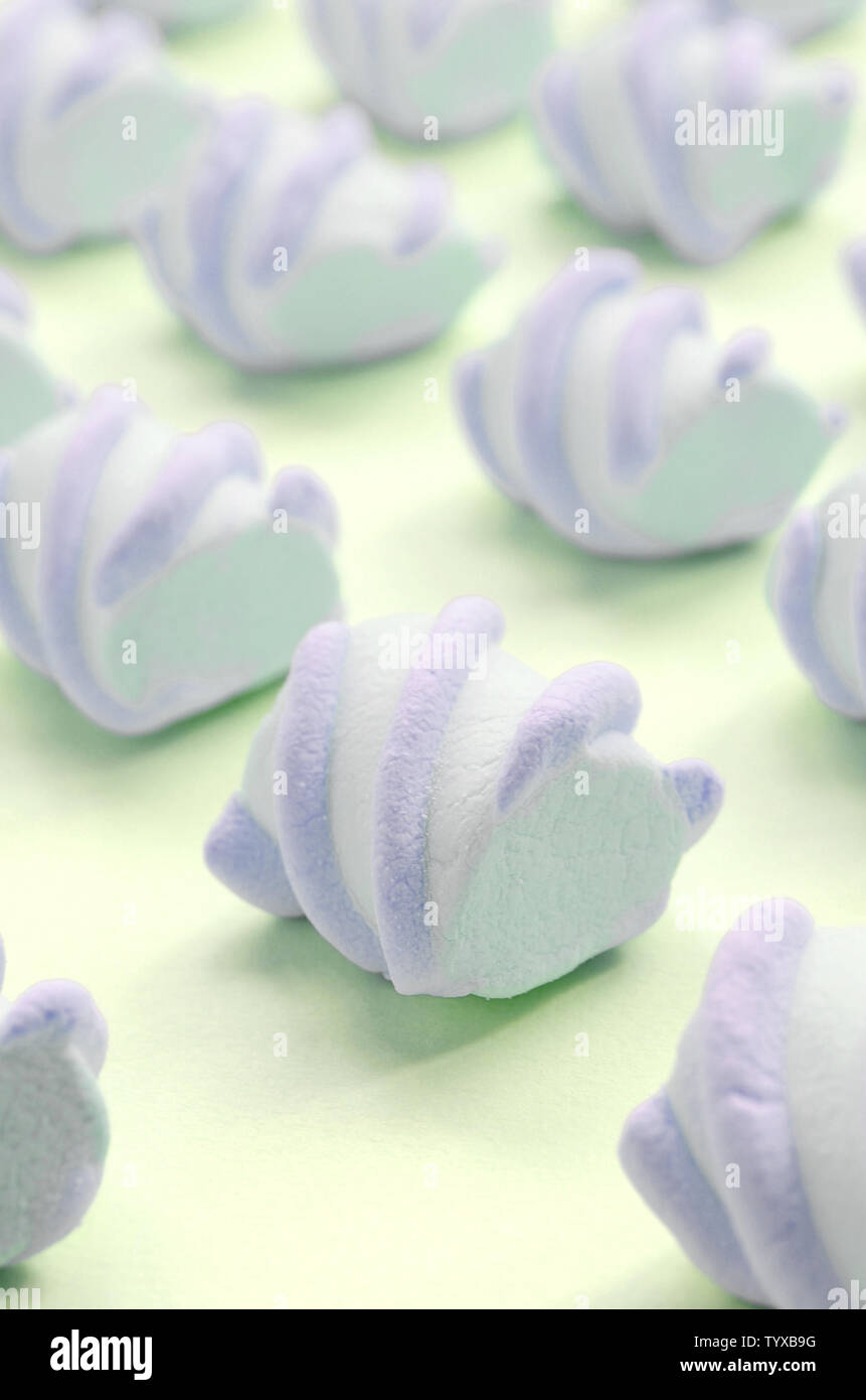 Colorful marshmallow laid out on lime paper background. pastel creative ...