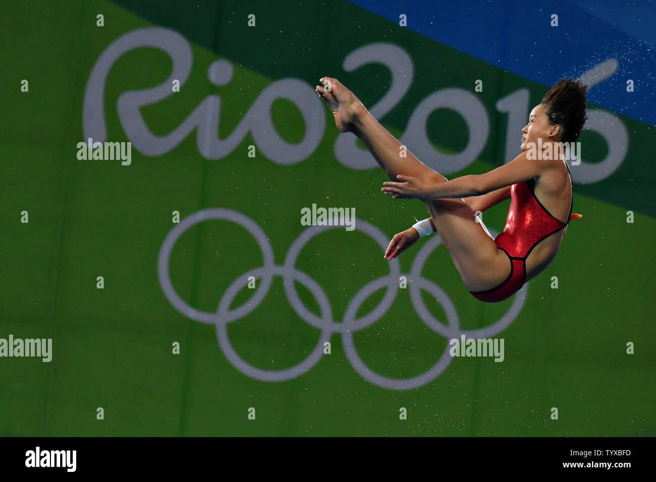 Gold medalist Ren Qian during competes in the Women's 10m Platform ...