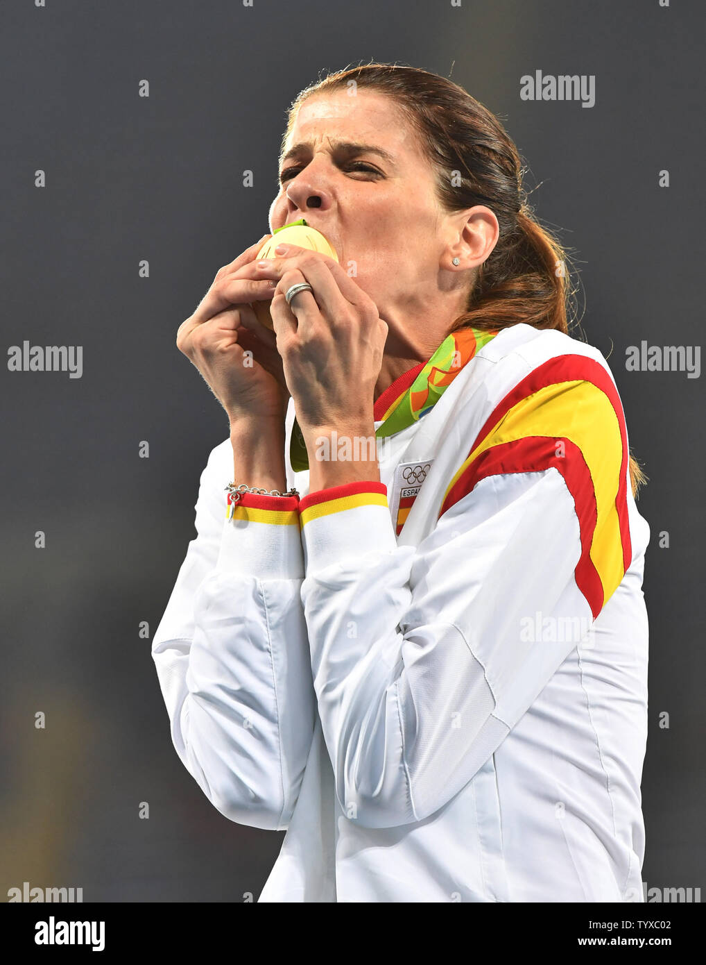 Ruth Beitia of Spain reacts on the podium at the medal ceremony for the ...