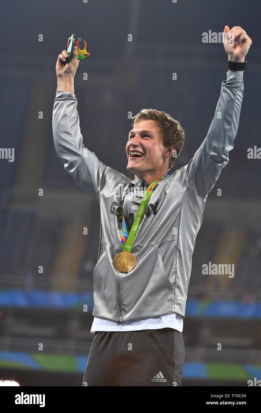 Thomas Rohler of Germany celebrates on the podium during the medal ...