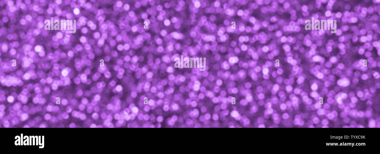Blurred purple decorative sequins. Background image with shiny bokeh ...