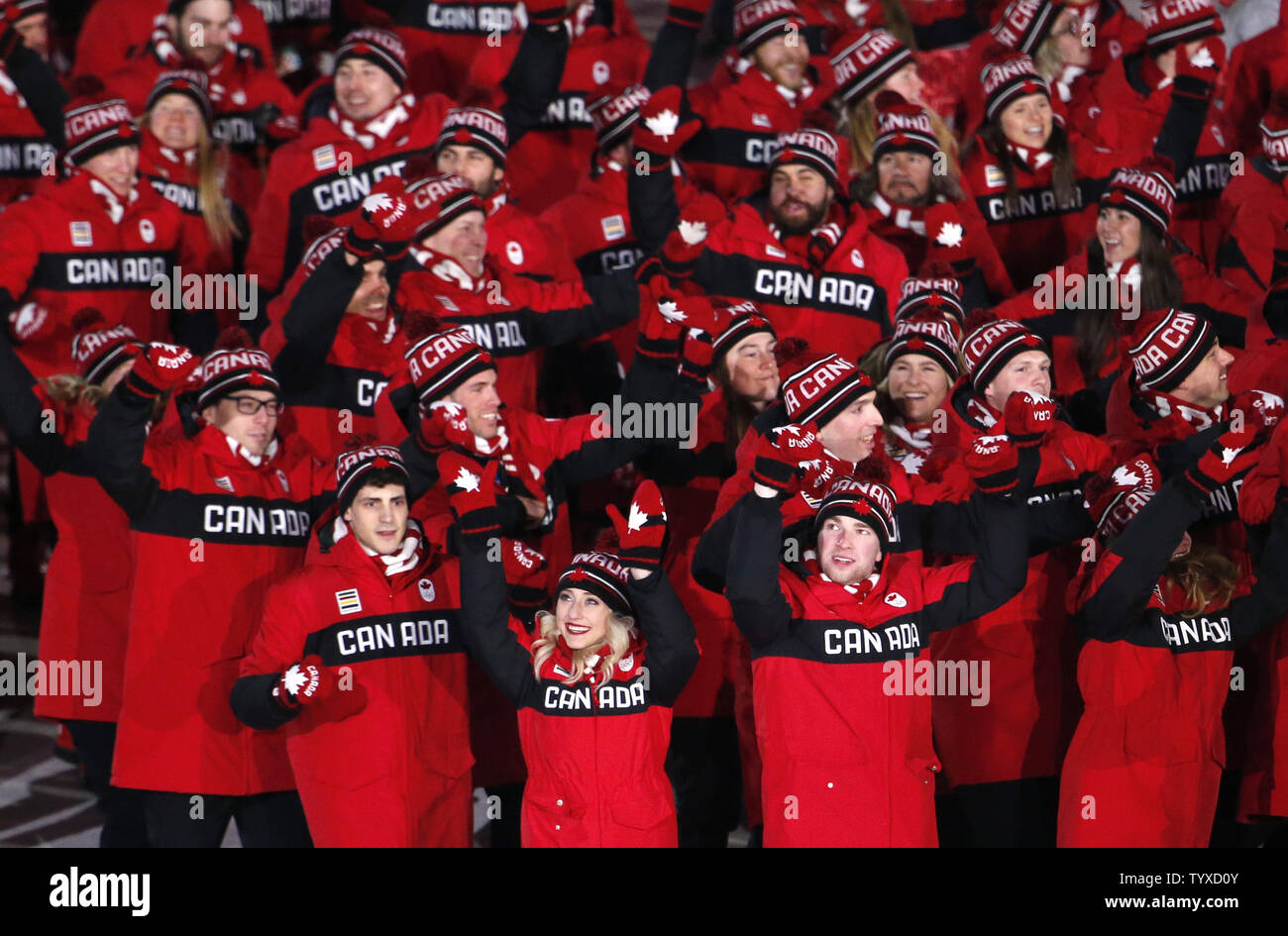 Athletes from Canada walk into the stadium during the opening ceremony ...