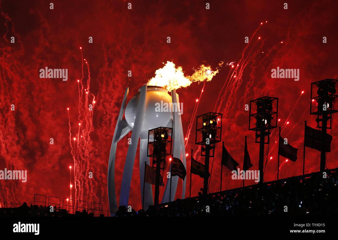 The Olympic Torch is lit during the opening ceremony at the Pyeongchang ...