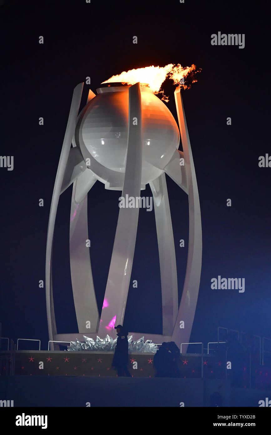 The Cauldron is lit with the Olympic Flame during the opening ceremony ...