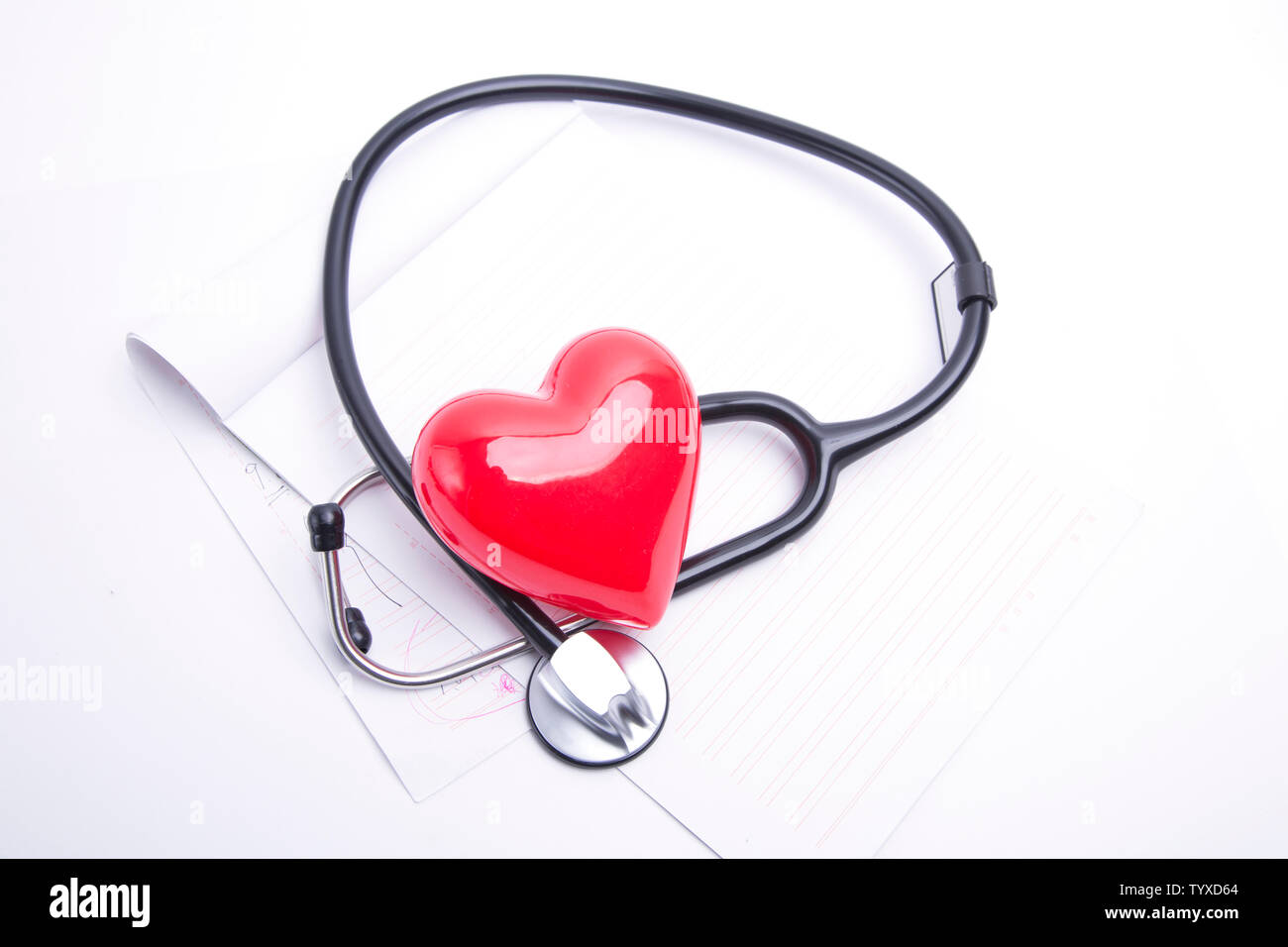 Red love and stethoscope on table Stock Photo - Alamy