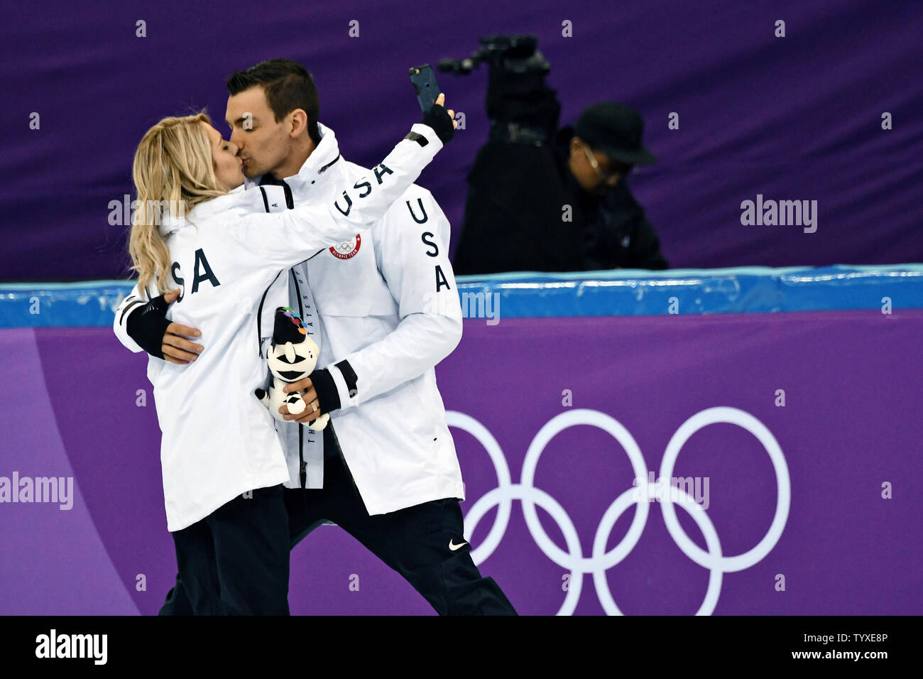 Husband and wife teammates Alexa Scimeca Knierim and Chris Knierim kiss ...