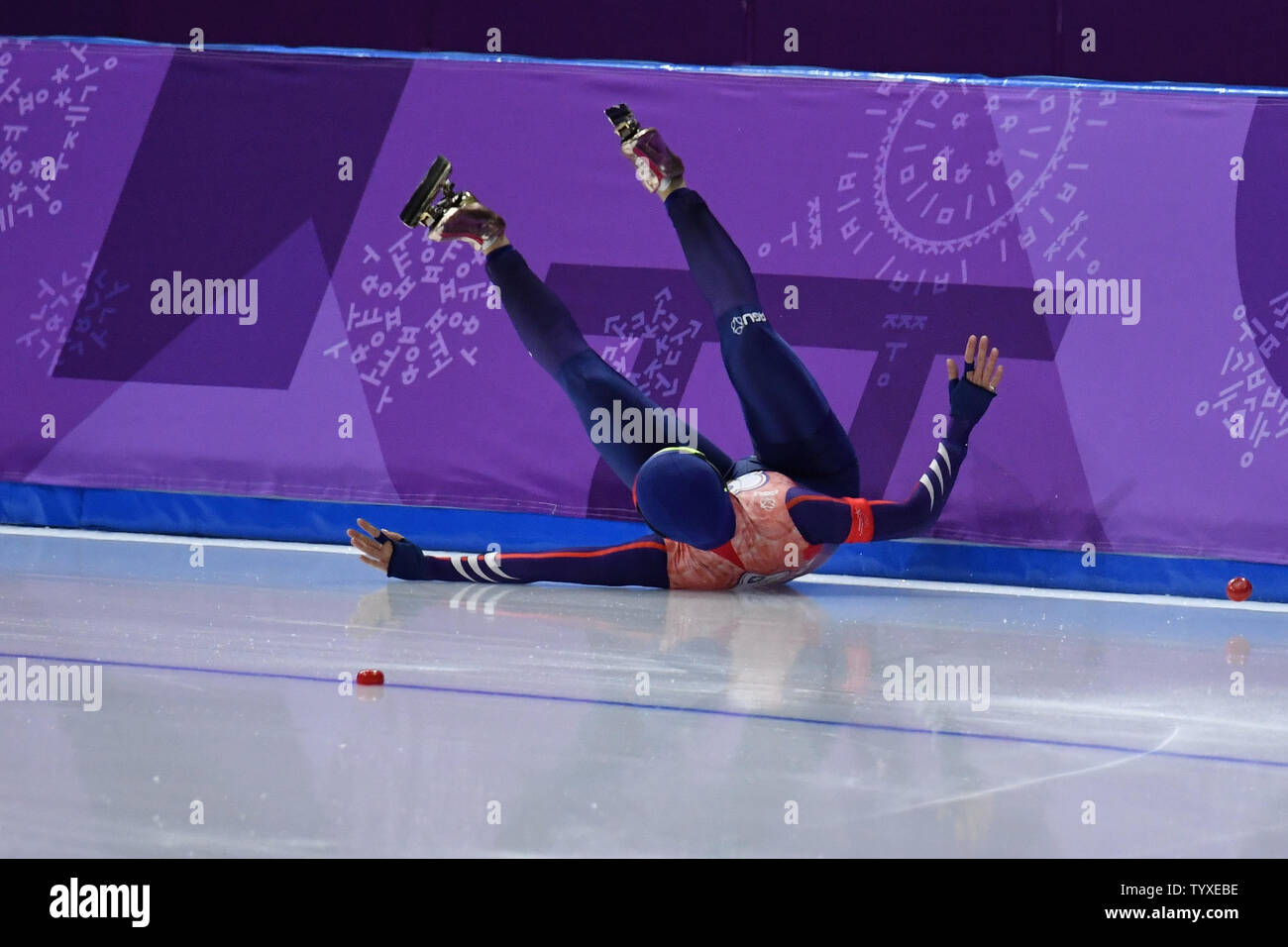 Huang Yu-Ting of China Taipei slides into the barriers during the ...