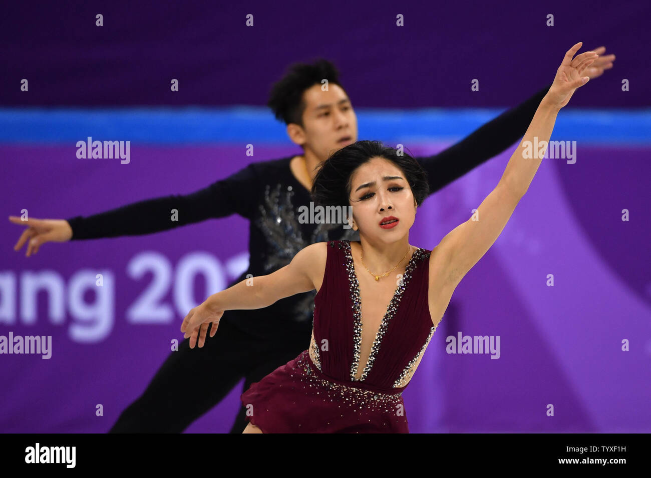 Wenjing Sui and Cong Han of China compete in the Pairs Figure Skating ...