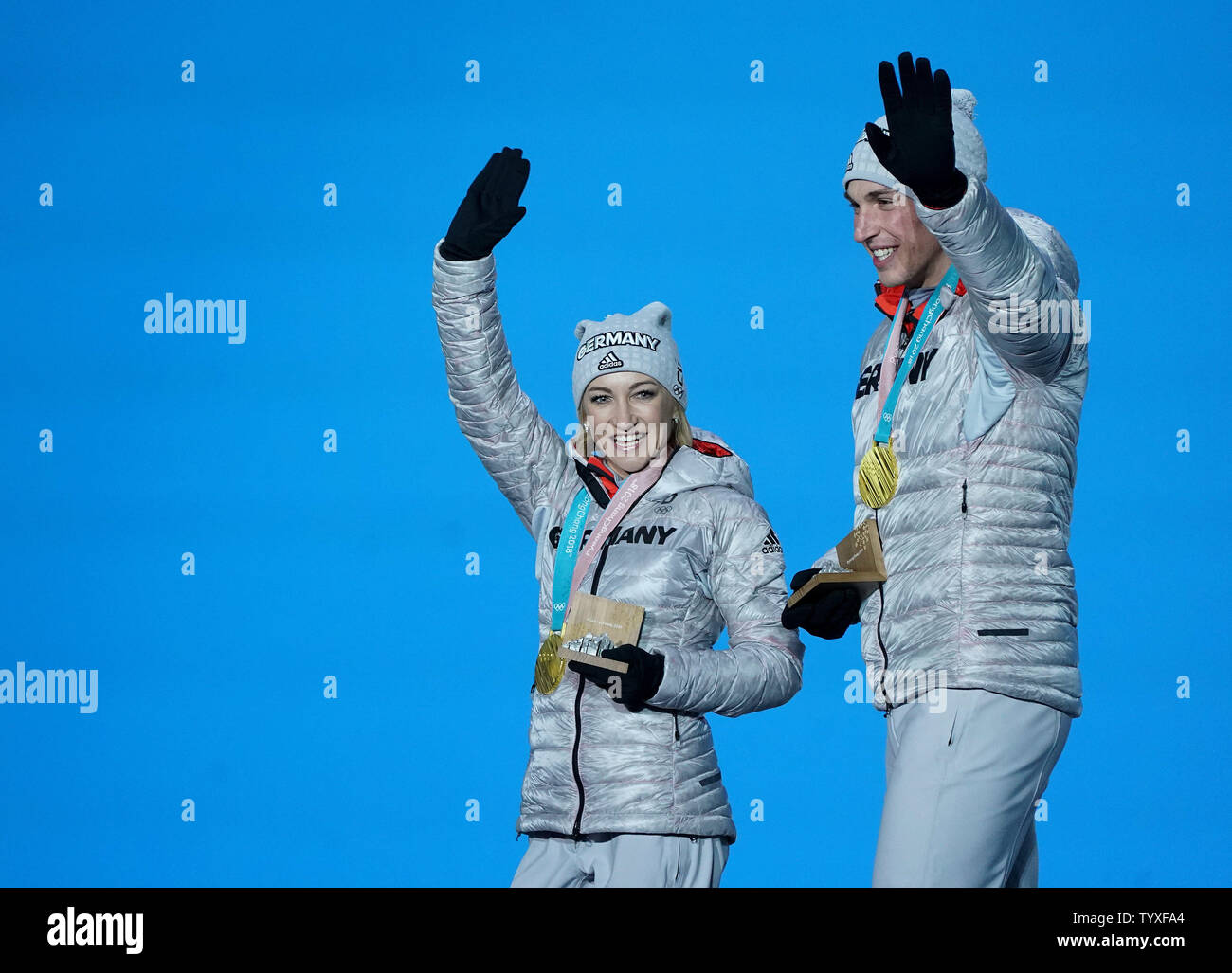 Gold medalist Germany's Aljona Savchenko and Bruno Massot wave during ...