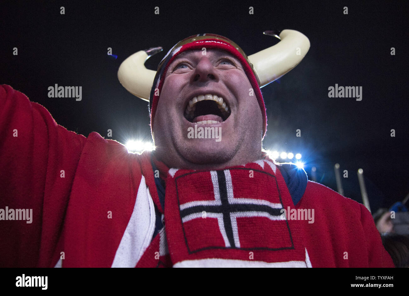 A Norwegian fan cheers as Noray's Silver medalist Norway's Kjetil ...