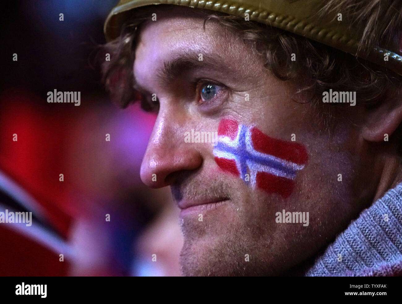 A Norwegian fan cheers watches Noray's Silver medalist Norway's Kjetil ...
