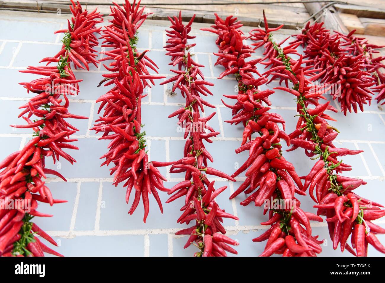 Farmhouse red pepper decoration Stock Photo - Alamy