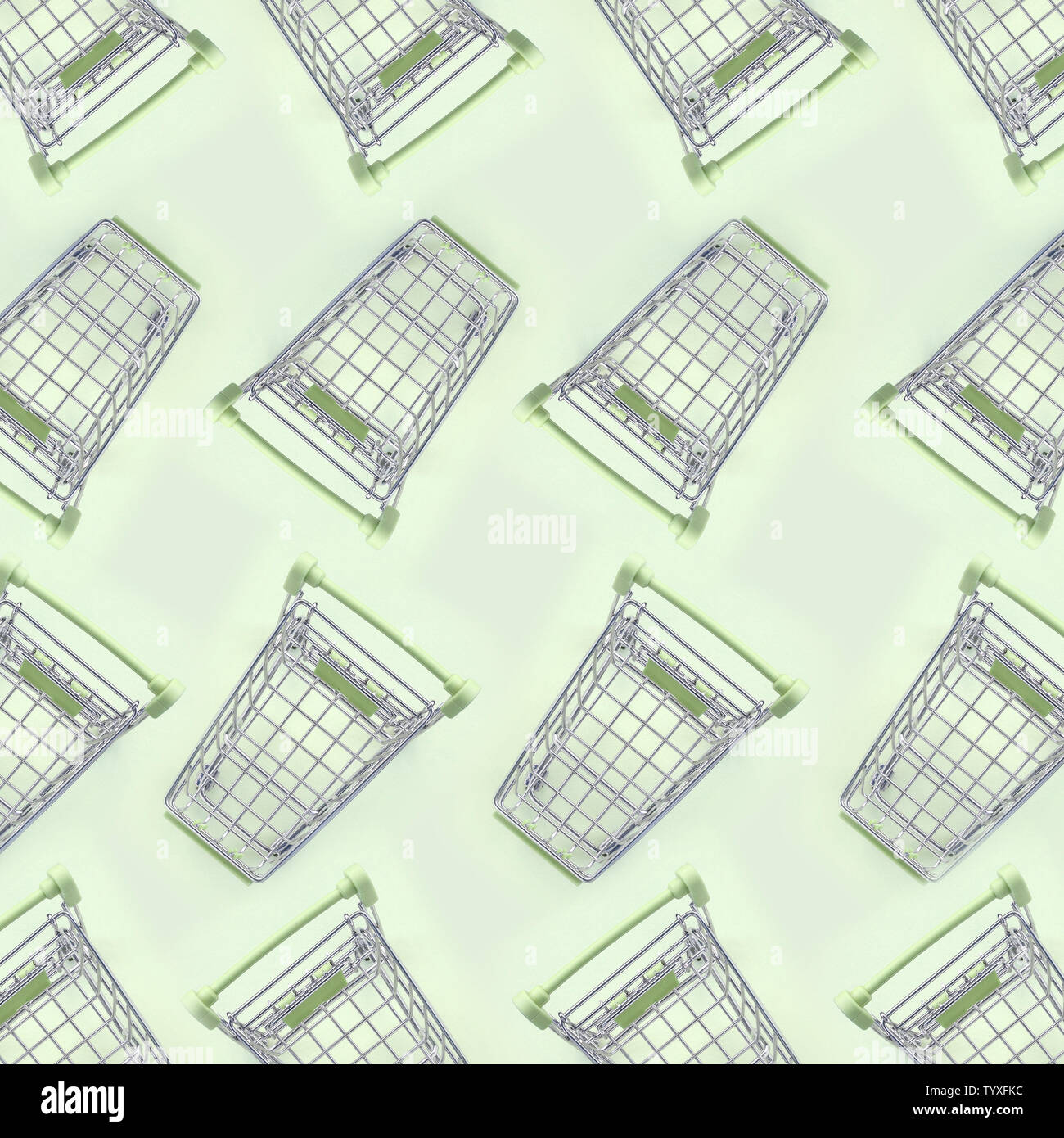 Pattern of many small shopping carts on a lime background. Minimalism ...
