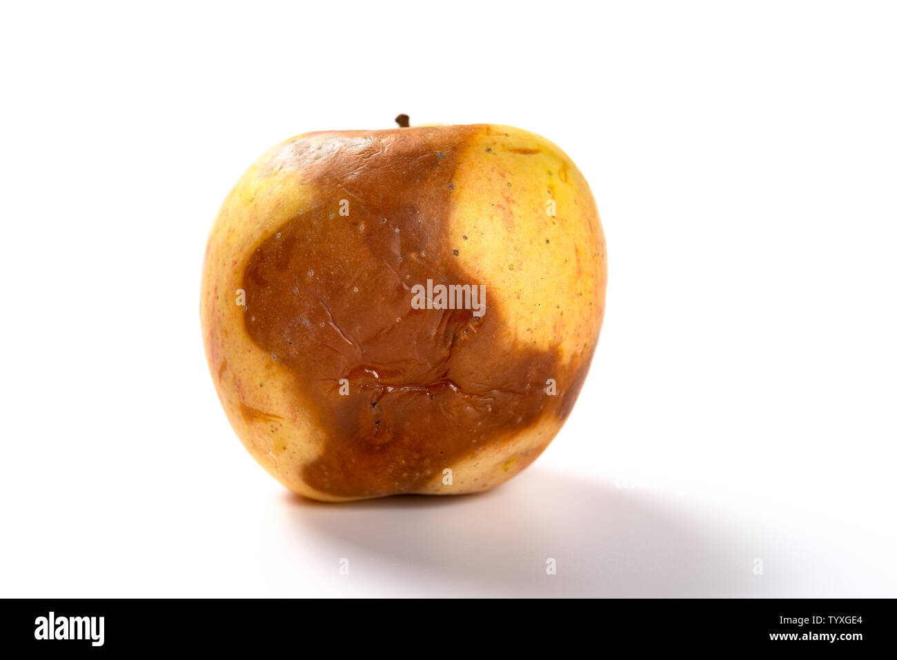 side view rotten apple on a white background Stock Photo - Alamy