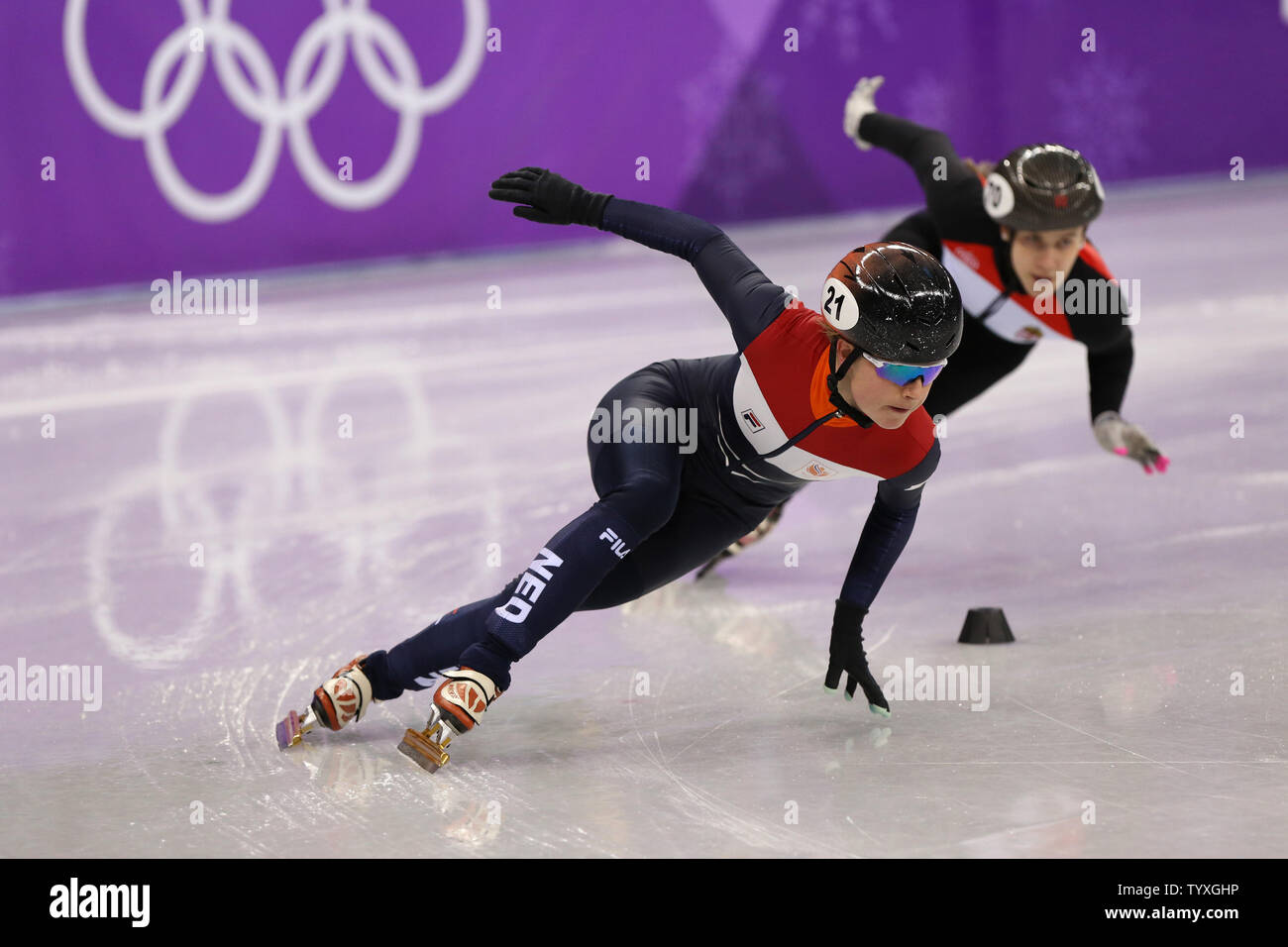 Skater Yara van Kerkhof of the Dutch relay team leads as she helps her ...