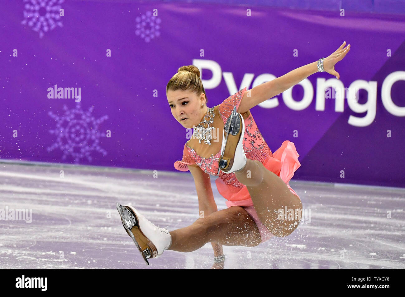 Maria Sotskova of Russia takes a fall in the Ladies Single Skating ...