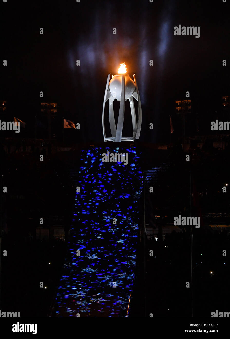 The Olympic torch is lit at the closing ceremony for the Pyeongchang ...