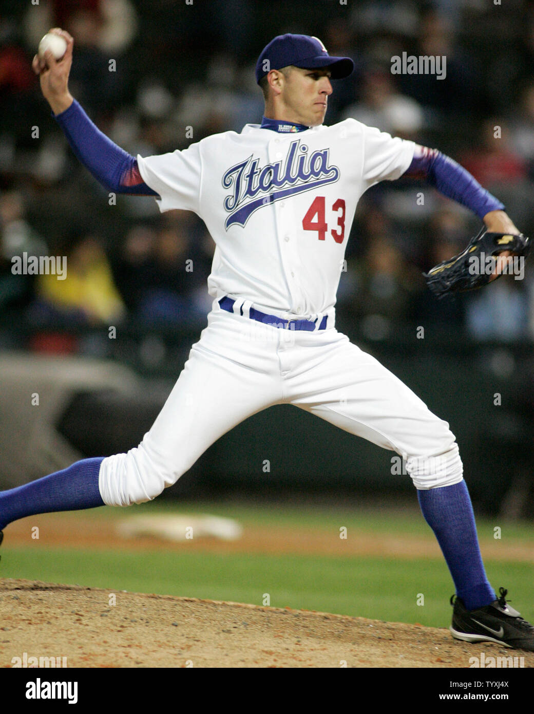 Italian national team pitcher Ricardo De Santis works against the ...