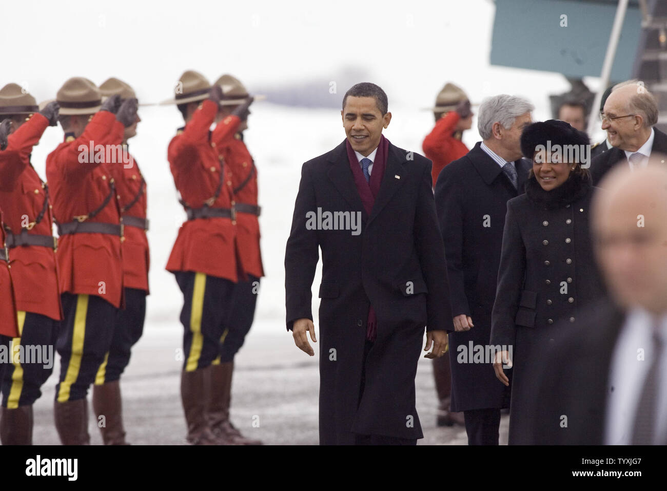 U.S. President Barack Obama is greeted and escorted by the Governor General of Canada, Michaelle ...