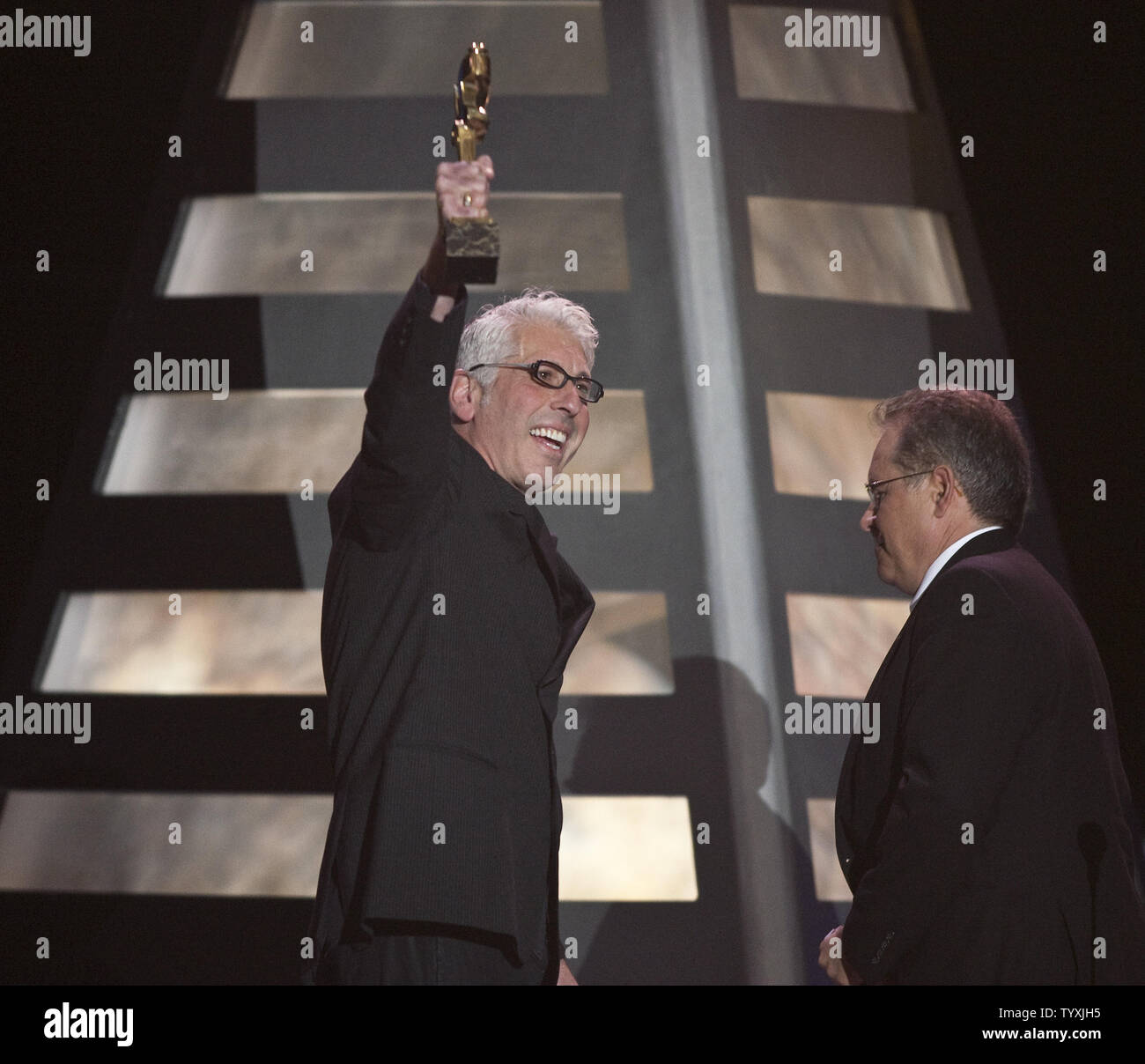 Niv Fichman (L) and Francis Damberger receive "The Golden Reel Award ...