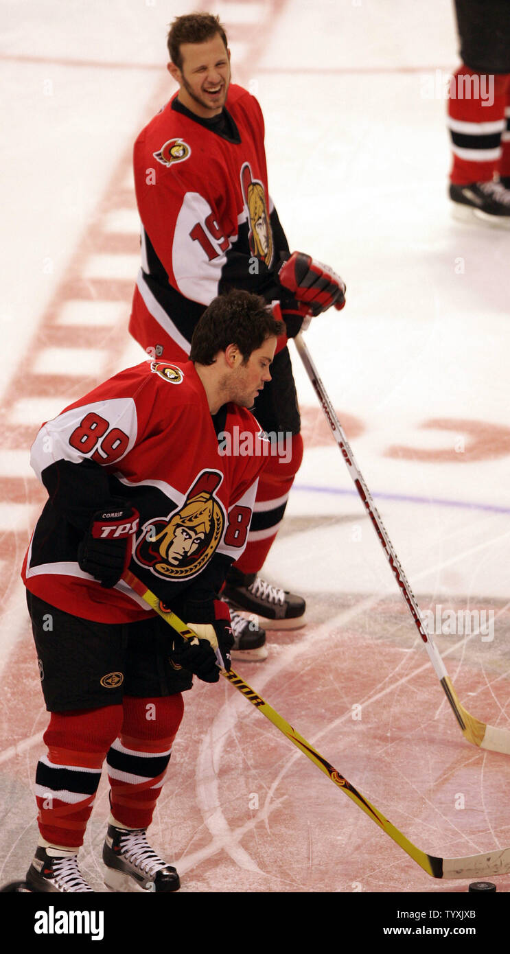 Ottawa Senators players Jason Spezza (19) and Mike Comrie (89) share a ...