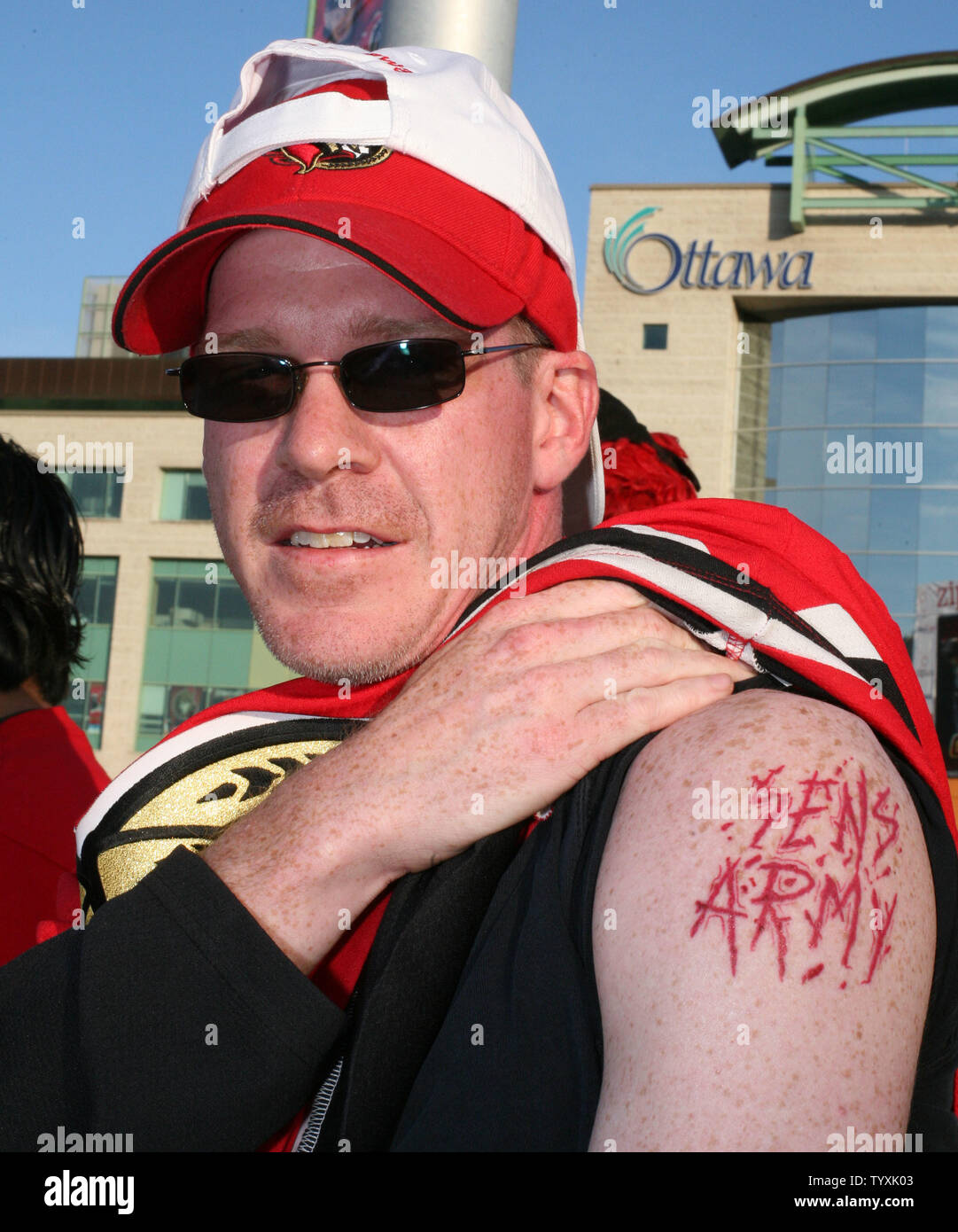 Ottawa Senators supporter Matt Allen shows off his new permanent tattoo ...