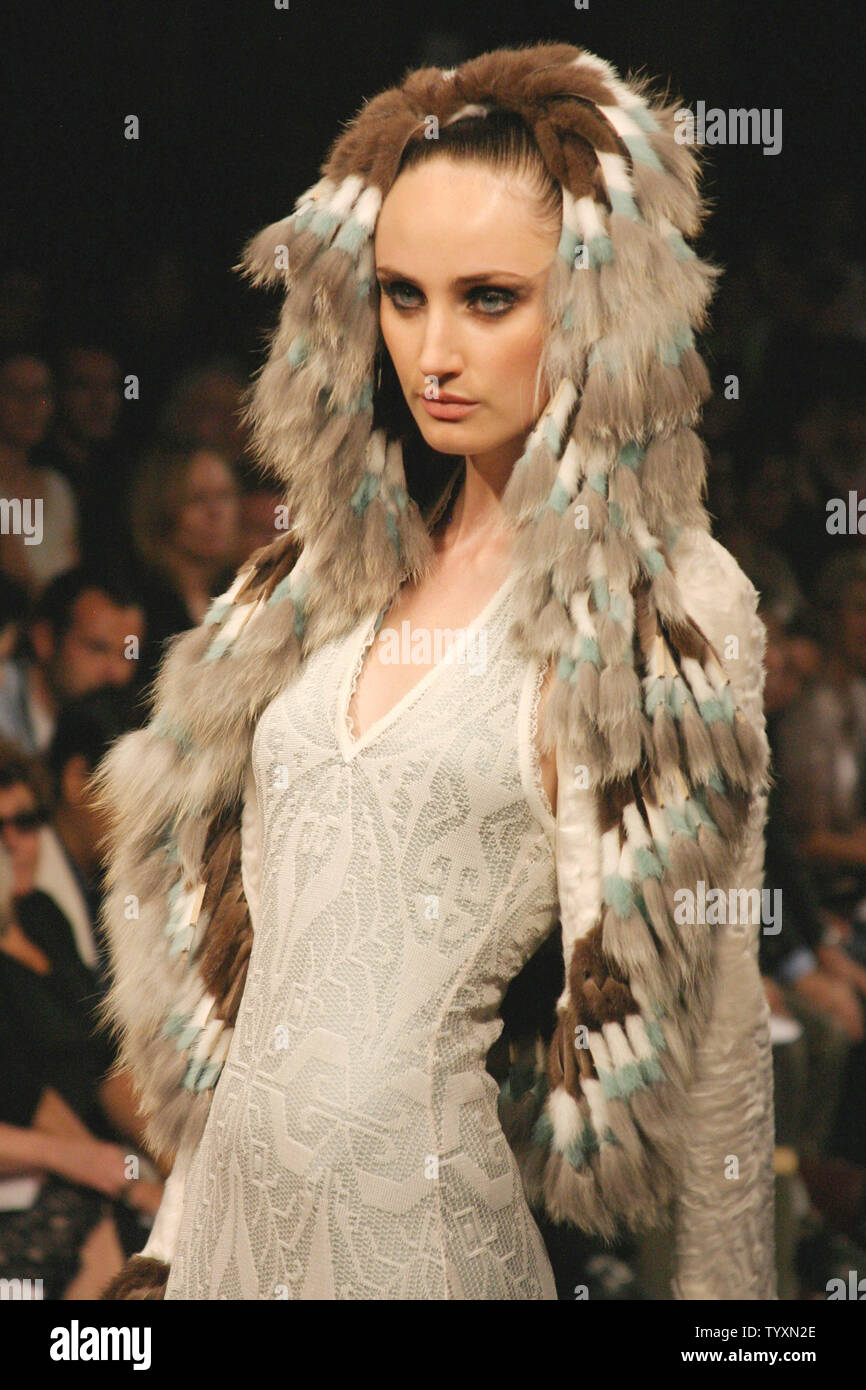 A model presents a new creation from designer Adam Jones during a ...