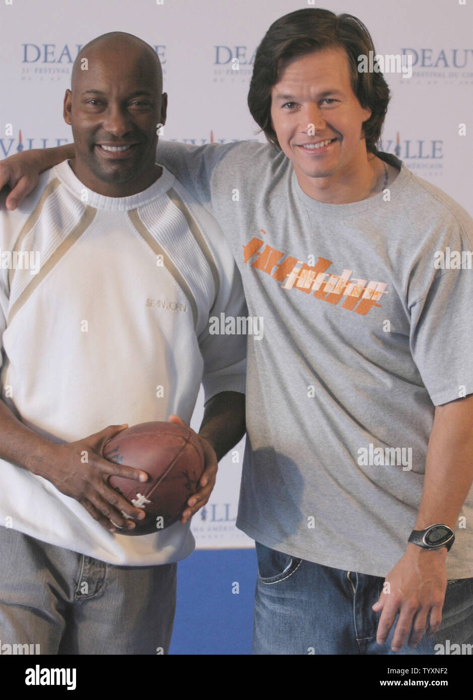 Director John Singleton and actor Mark Wahlberg pose during a photocall ...